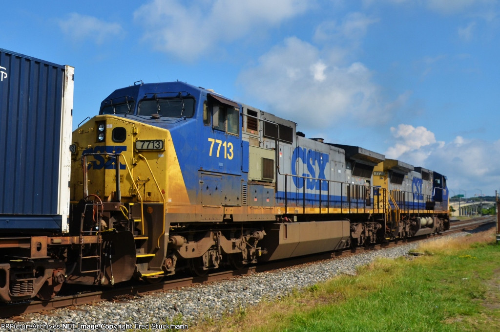 CSX 7713 has been playing in the mud.